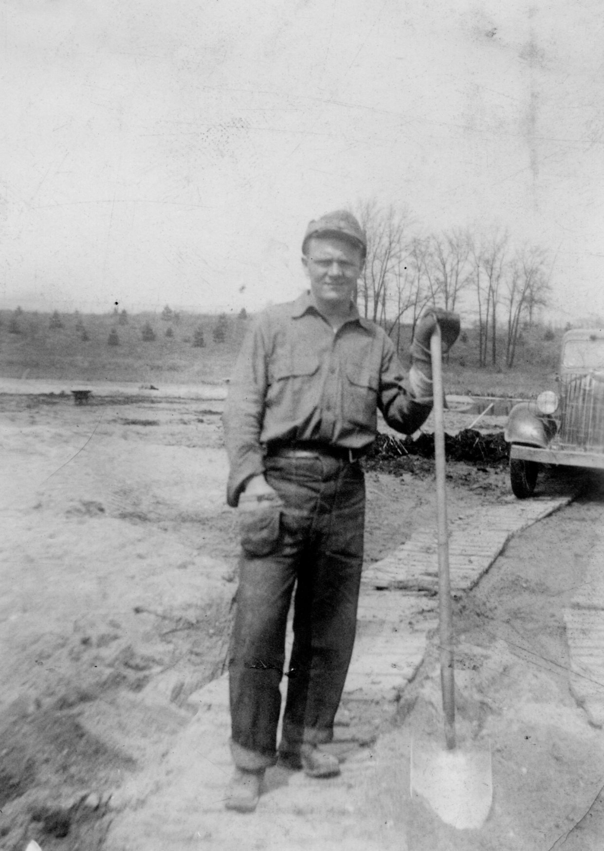 Man with Spade and Truck